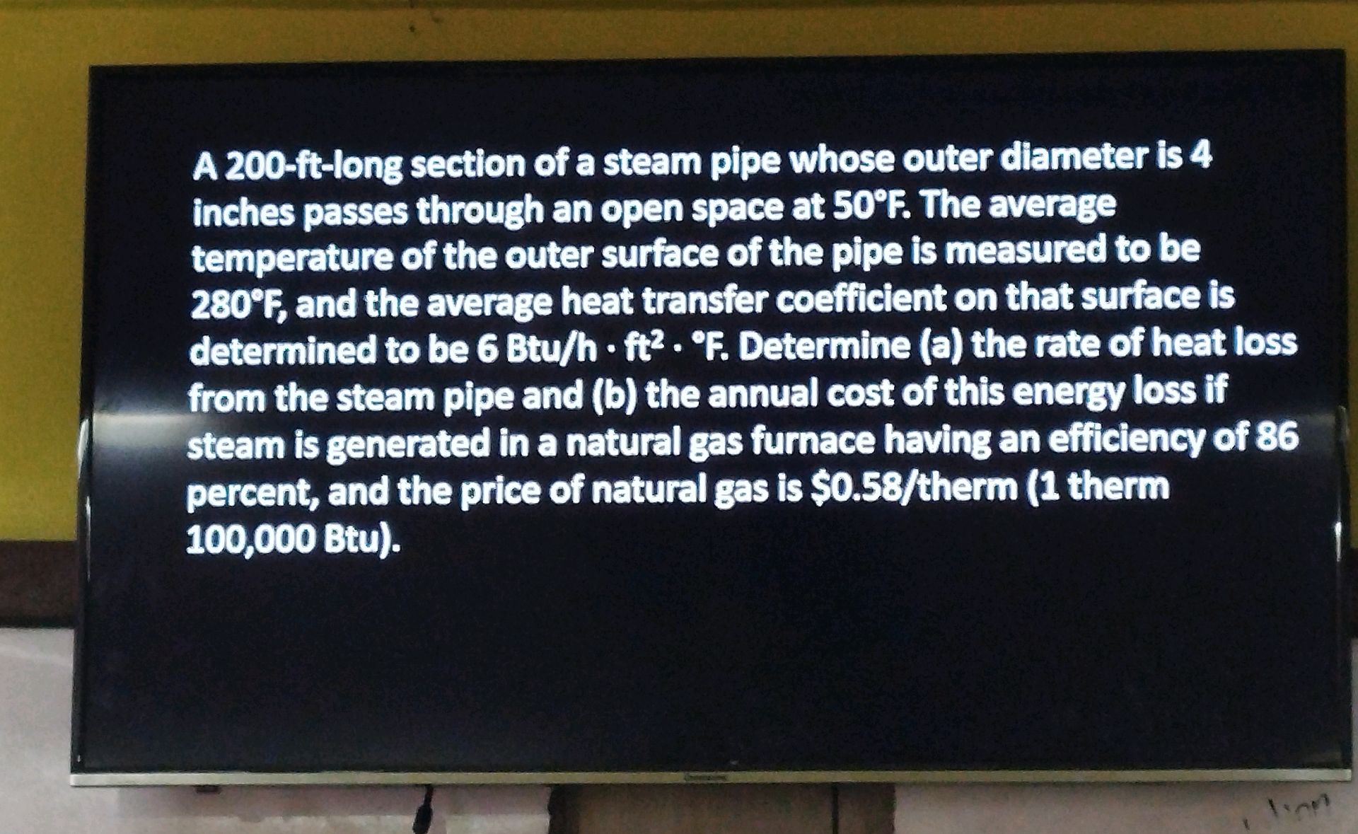 A 200-ft-long section of a steam pipe whose | StudyX
