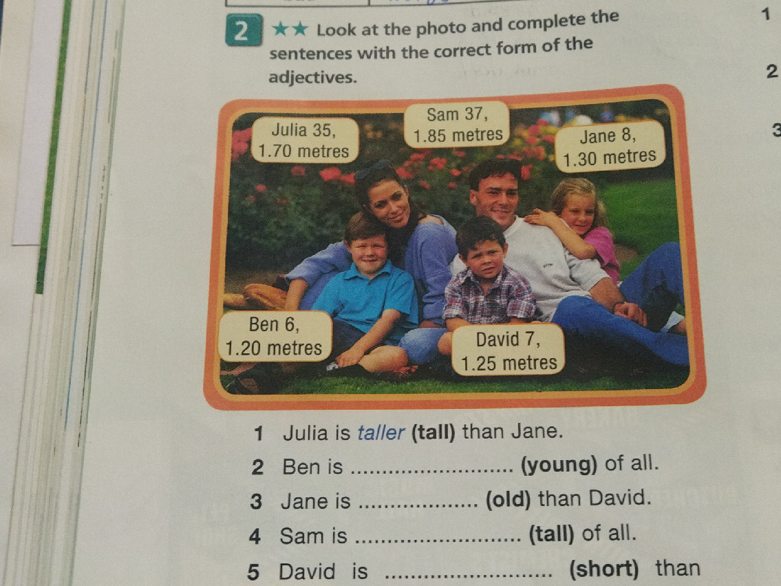 Look at the photo and complete the sentences | StudyX