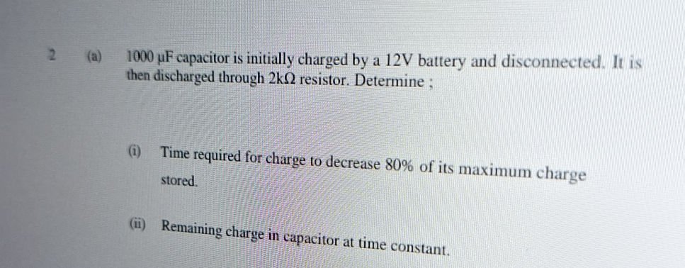 1000 µF capacitor is initially charged by a | StudyX