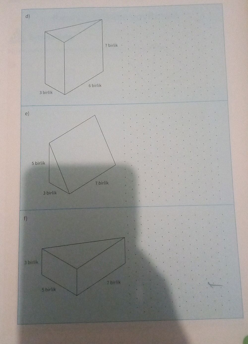 d) [Diagram of a triangular prism with | StudyX