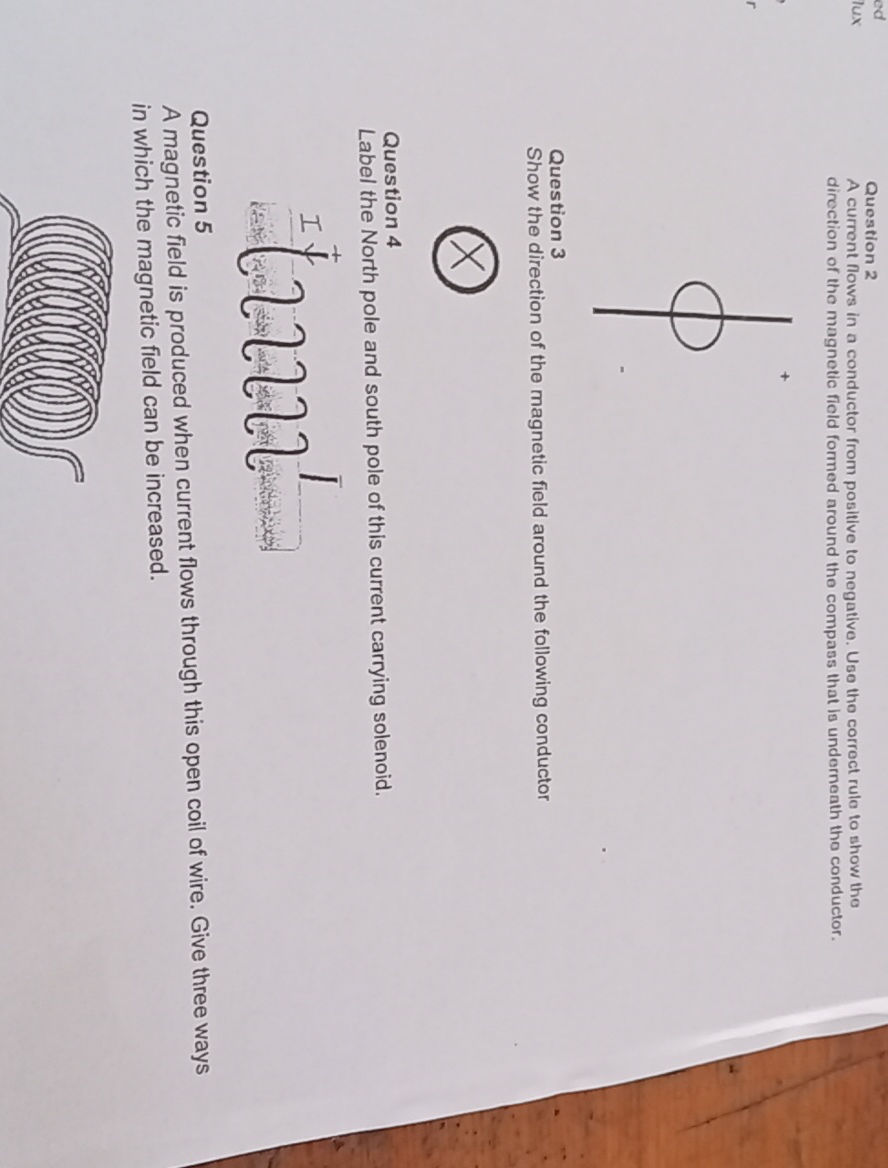 Question 2 A current flows in a conductor | StudyX