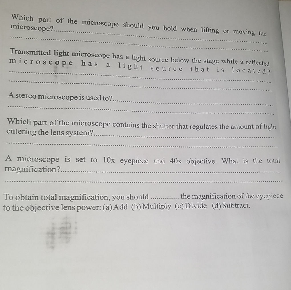 Which part of the microscope should you hold | StudyX
