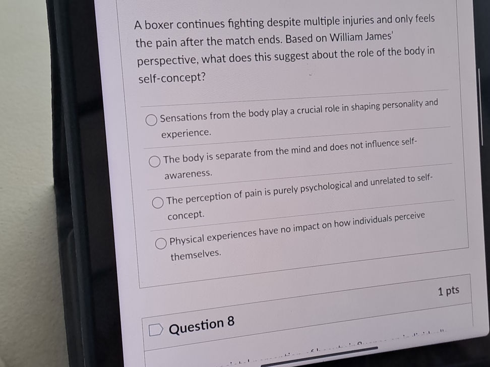 A boxer continues fighting despite multiple | StudyX