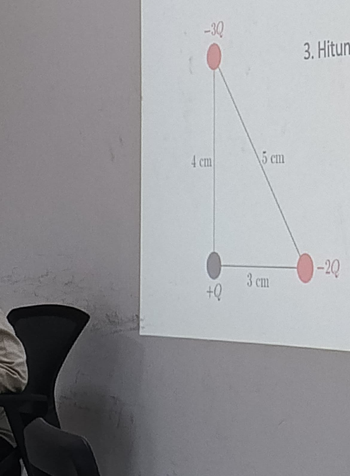 The image shows three charges arranged in a | StudyX