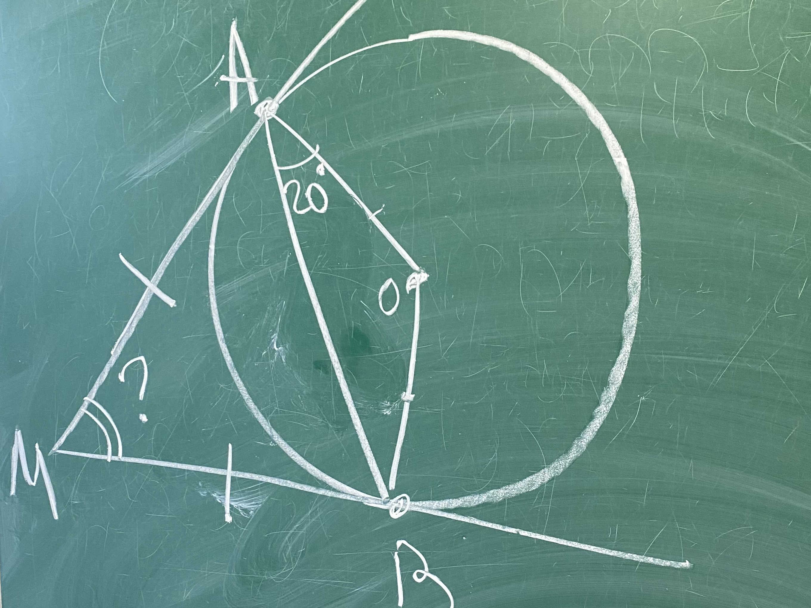Find the angle at M. There is a diagram of | StudyX
