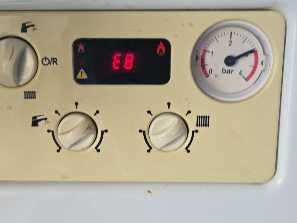 The image shows a boiler control panel with | StudyX