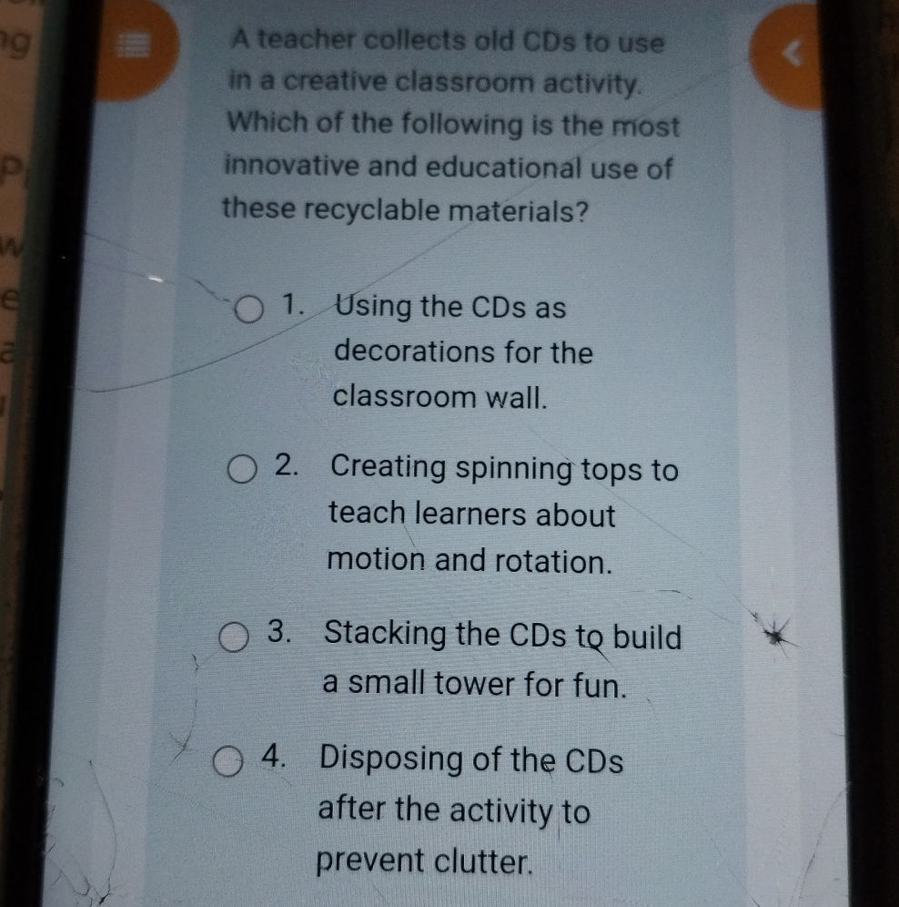 A teacher collects old CDs to use in a