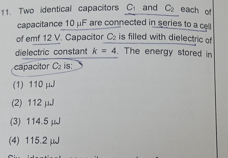 11. Two identical capacitors $C_1$ and $C_2$ | StudyX