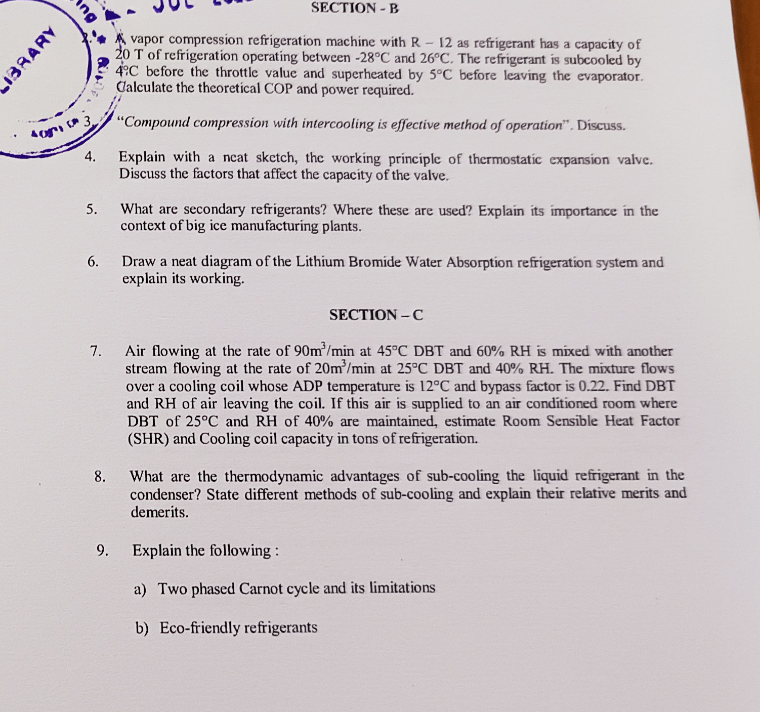 1. A vapor compression refrigeration machine | StudyX