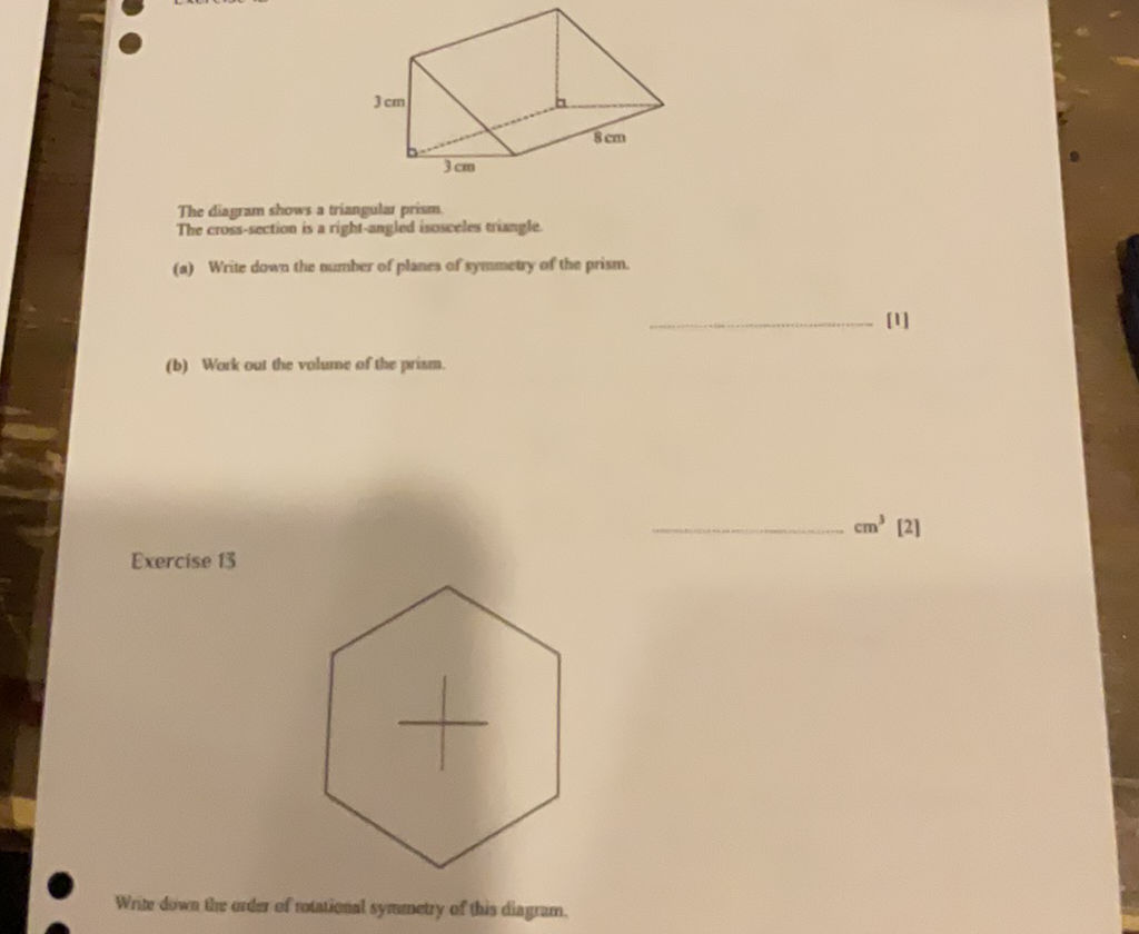 The diagram shows a triangular prism. The | StudyX