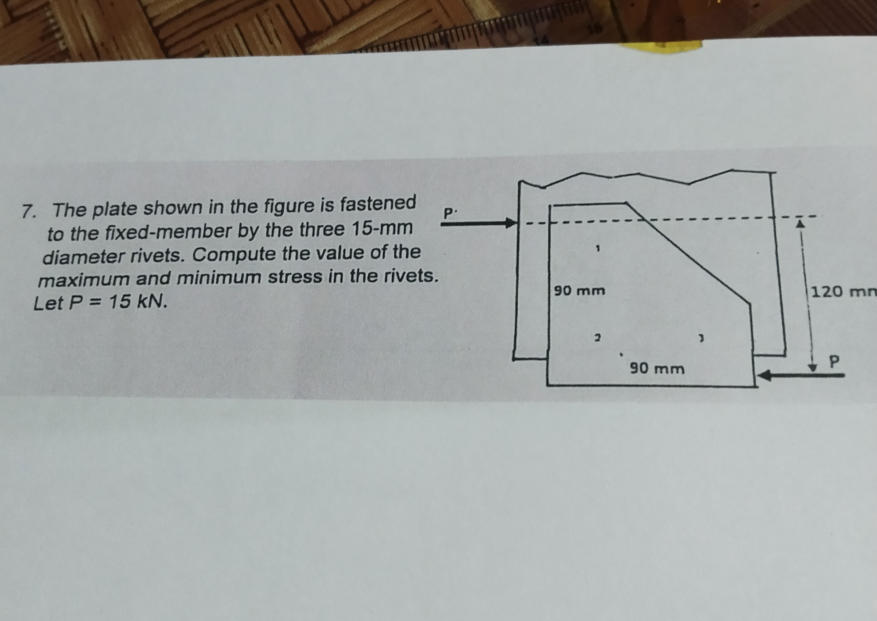 7. The plate shown in the figure is fastened | StudyX