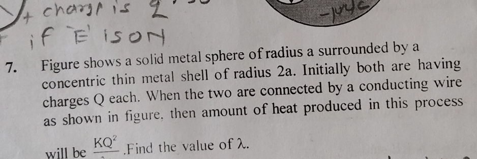 7. Figure shows a solid metal sphere of | StudyX