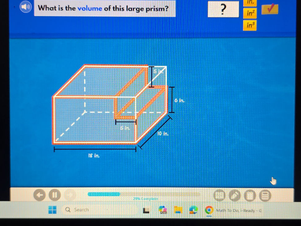 What is the volume of this large prism? | StudyX