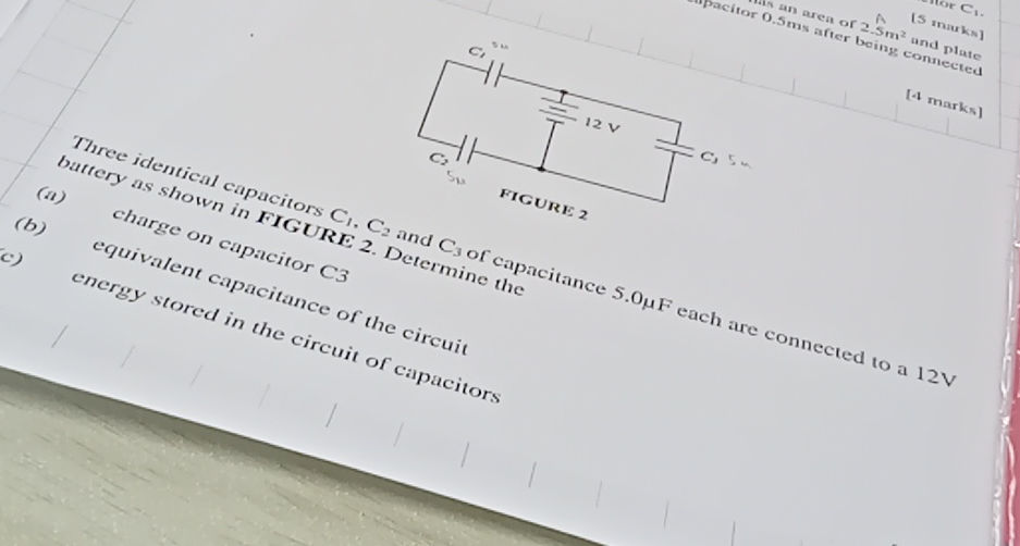Three identical capacitors C1, C2 and C3 of | StudyX