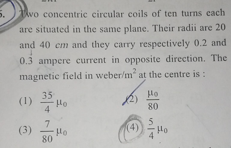 Two concentric circular coils of ten turns | StudyX