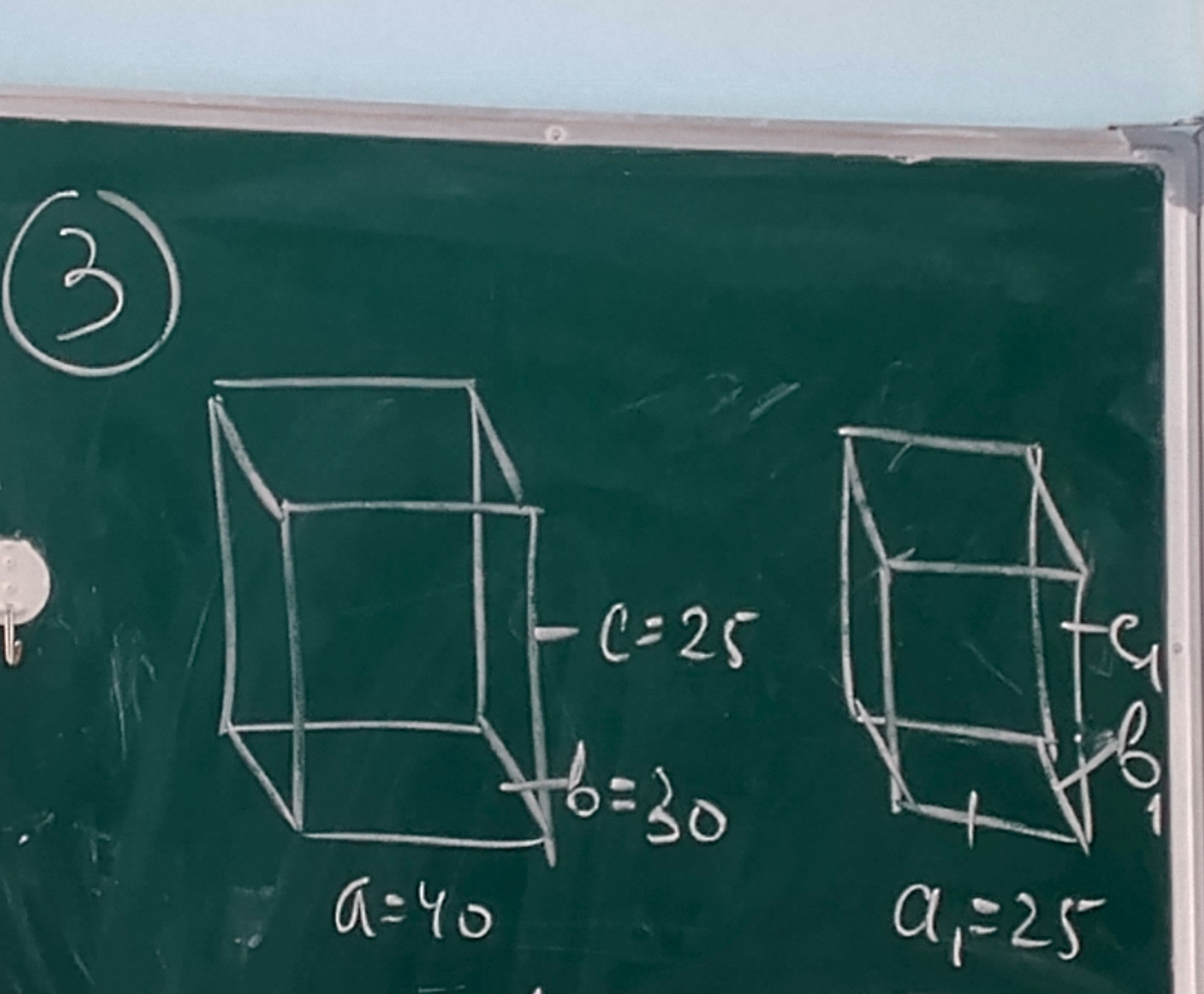 The image shows two 3D shapes with labeled | StudyX