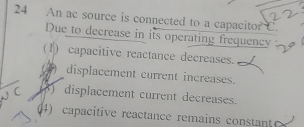 24 An ac source is connected to a capacitor | StudyX