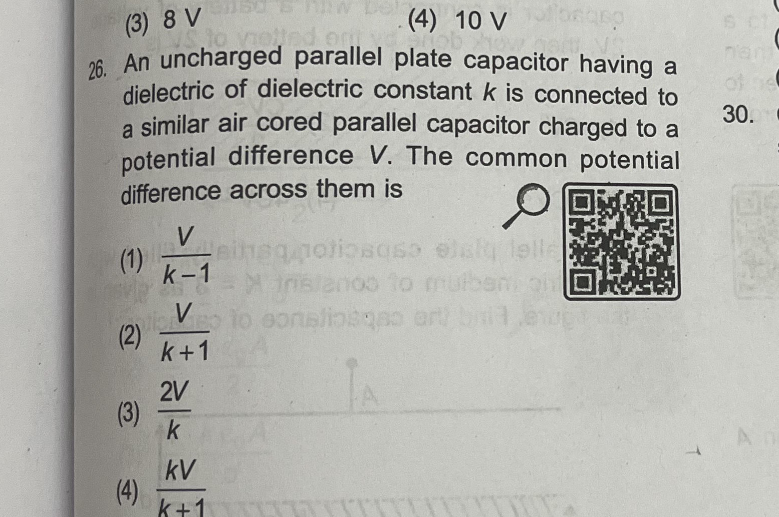 26. An uncharged parallel plate capacitor | StudyX