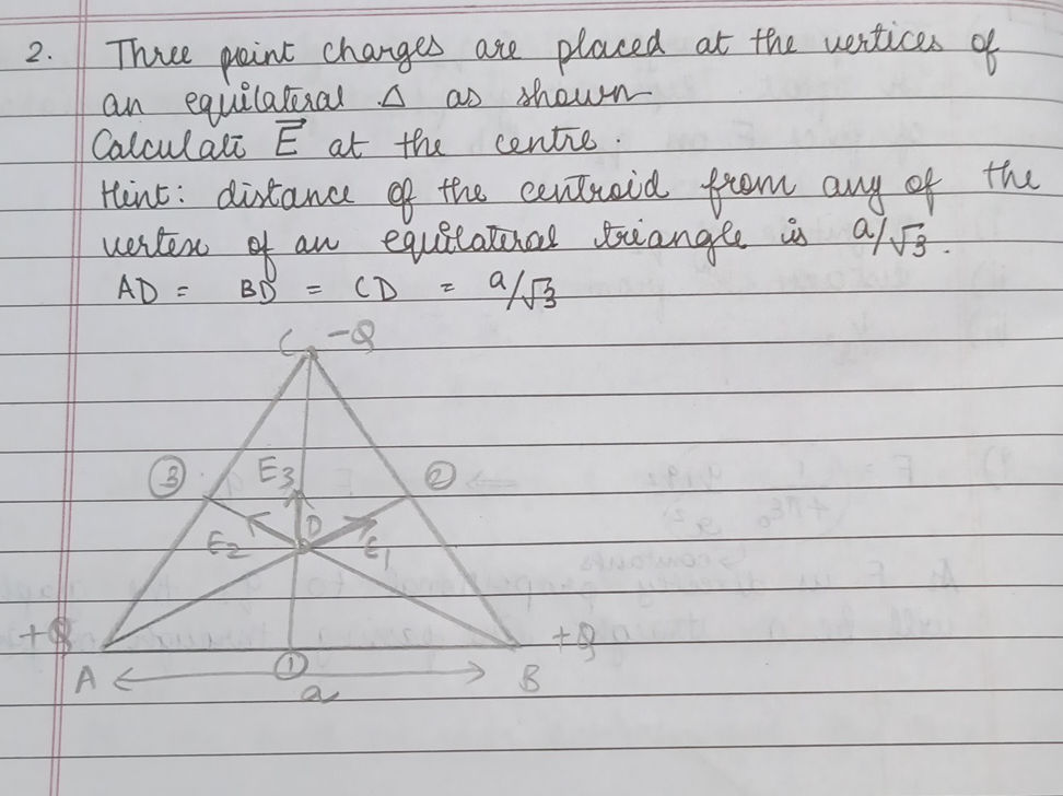 2. Three point charges are placed at the | StudyX