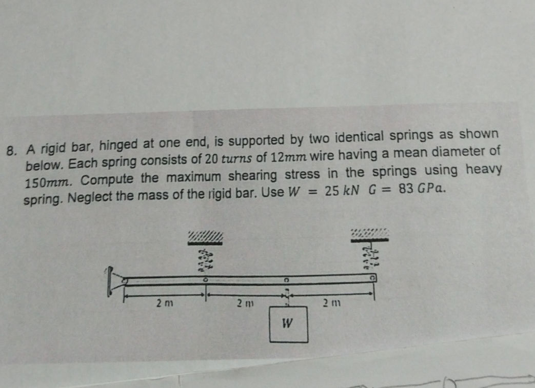 8. A rigid bar, hinged at one end, is | StudyX