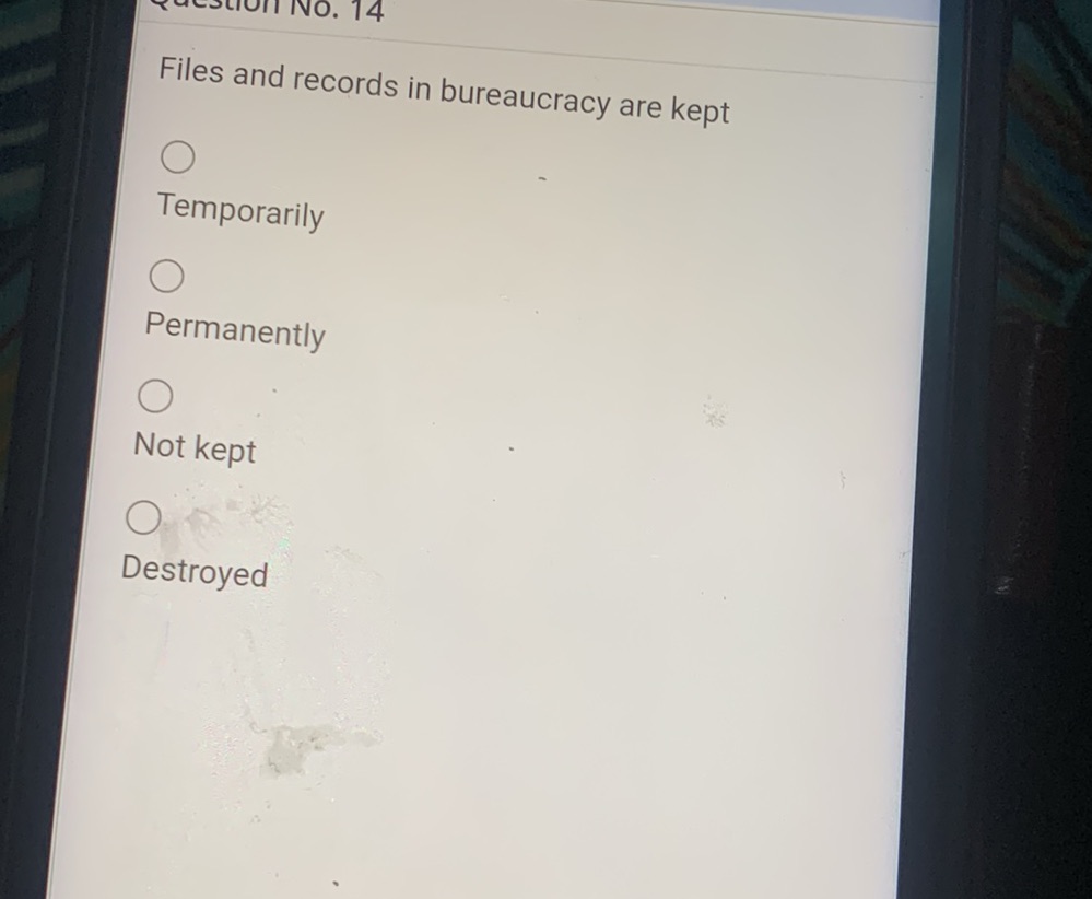 Files and records in bureaucracy are kept | StudyX