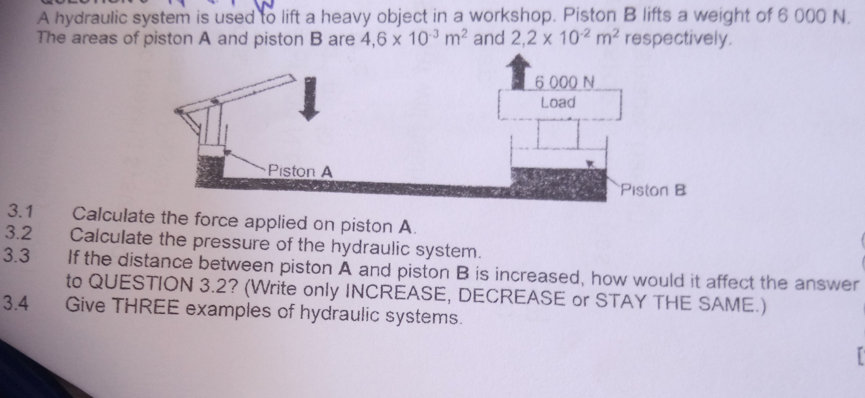 A hydraulic system is used to lift a heavy | StudyX