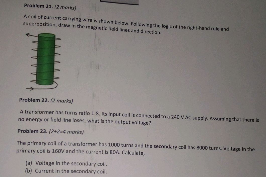 Problem 21. (2 marks) A coil of current | StudyX