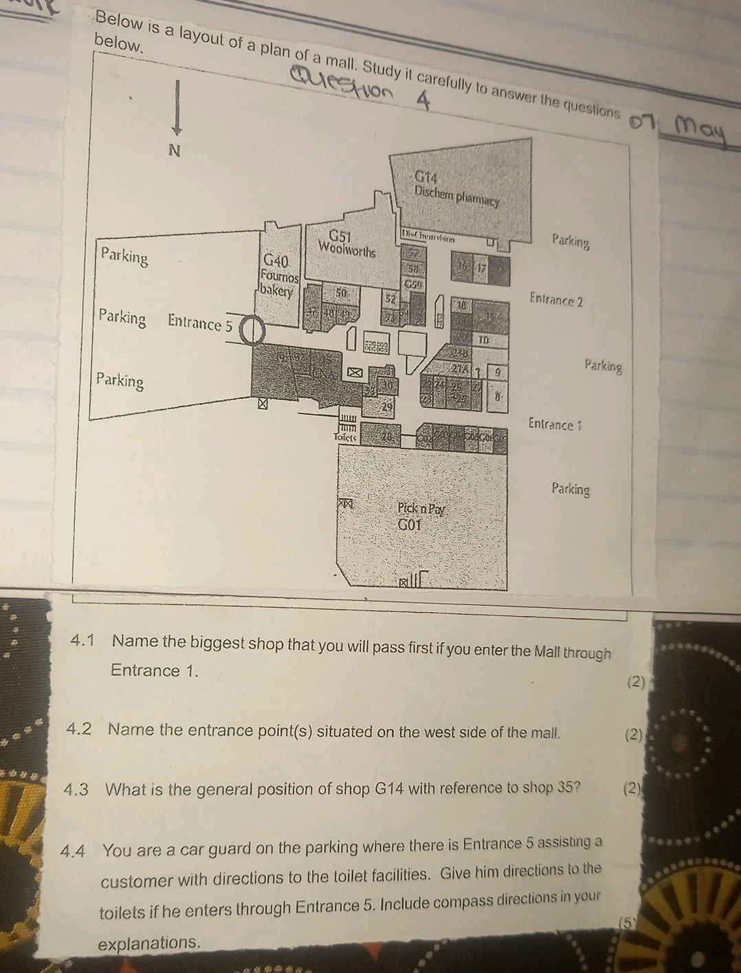 Below is a layout of a plan of a mall. Study | StudyX