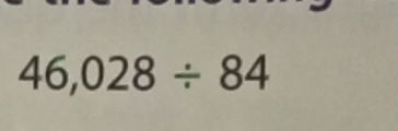 Division problem: 46,028 divided by 84 | StudyX
