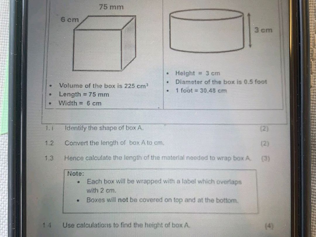 The image shows a box and a cylinder with | StudyX