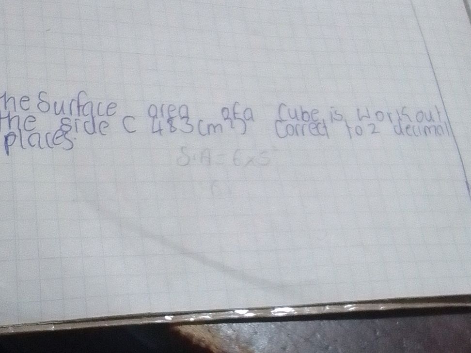 The surface area of a cube is 483 $cm^2$. | StudyX