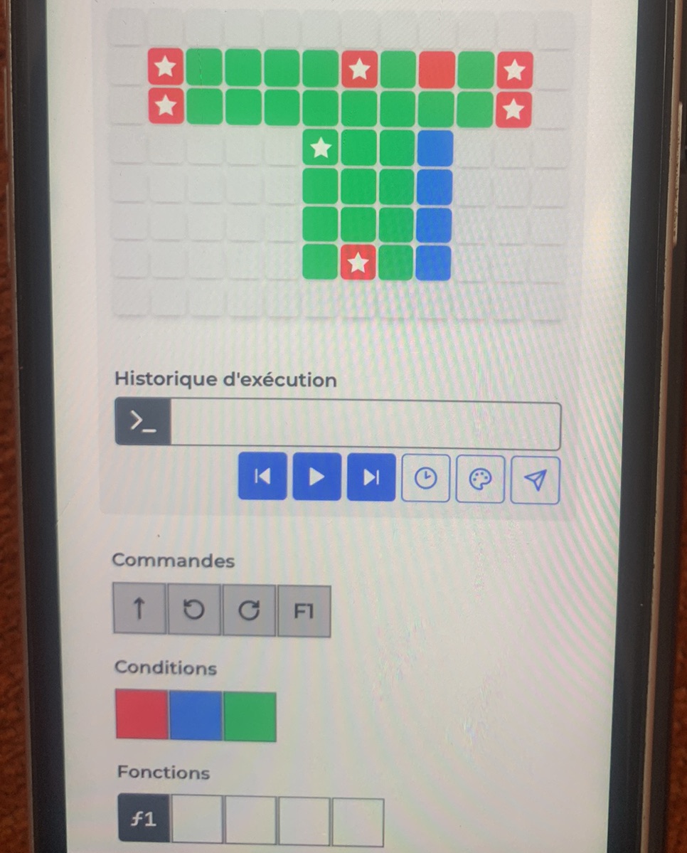 The image shows a grid with colored squares | StudyX