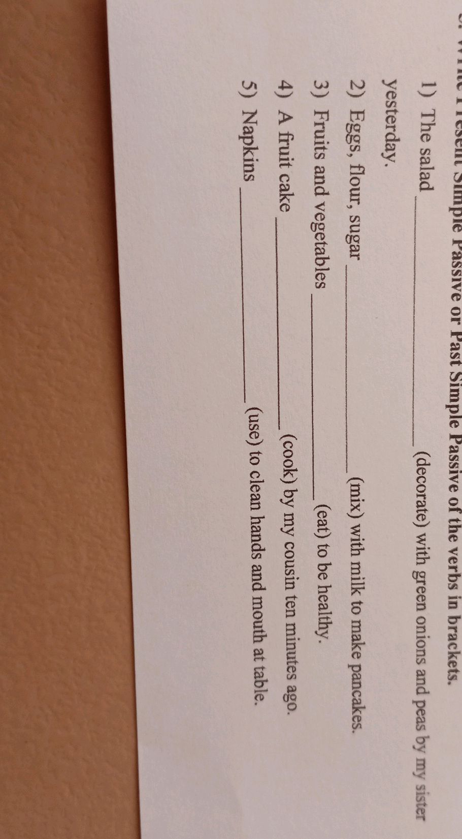 Write Present Simple Passive or Past Simple | StudyX