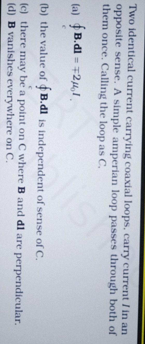 Two identical current carrying coaxial | StudyX