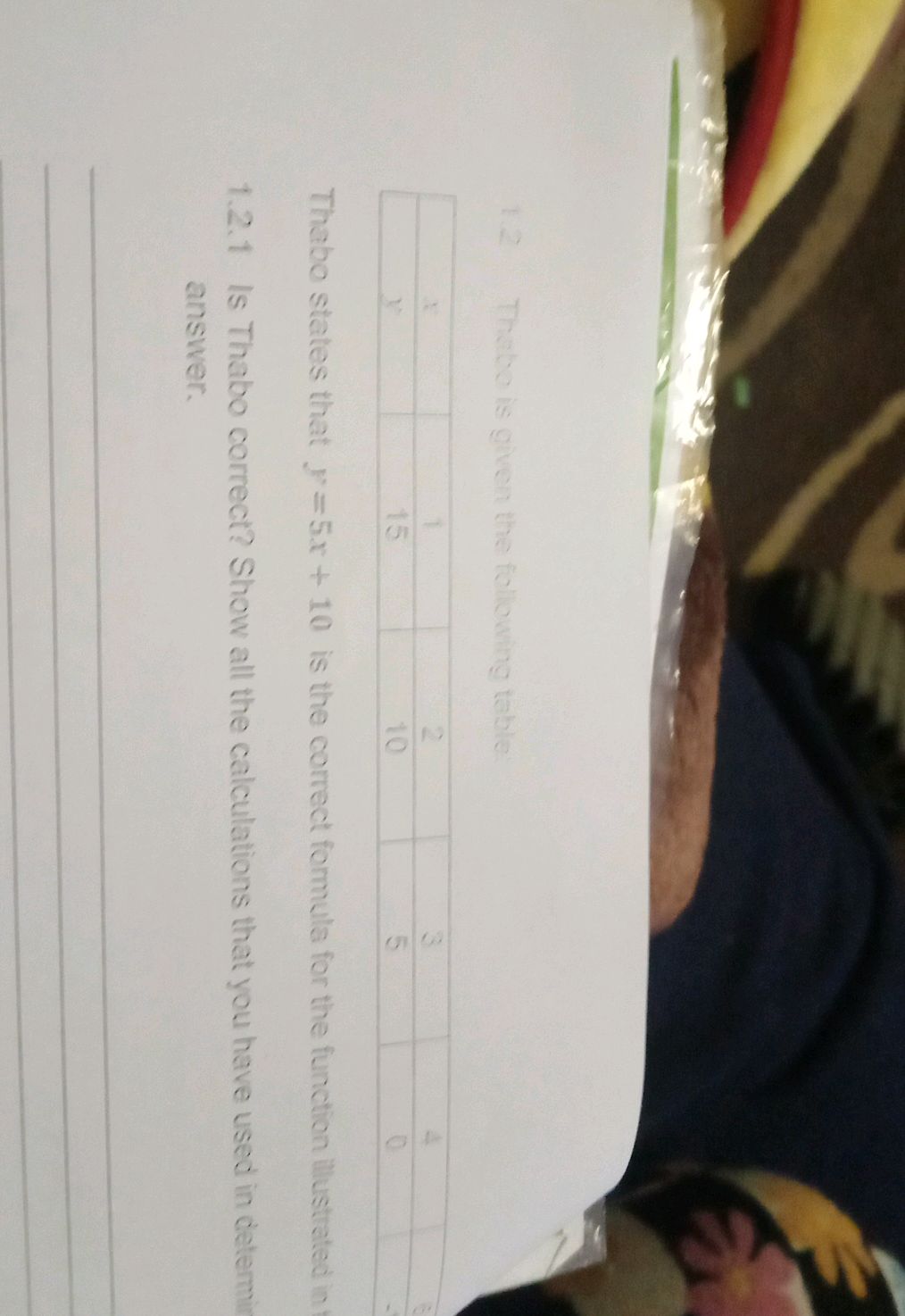 Thabo is given the following table: | x | y | StudyX