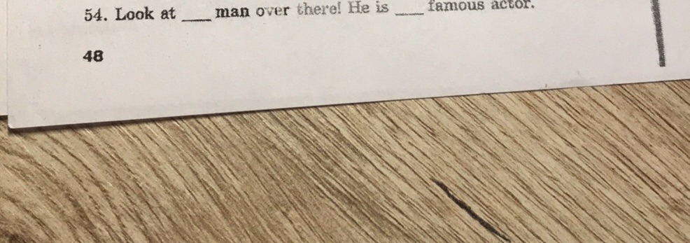 54. Look at ____ man over there! He is ____ | StudyX