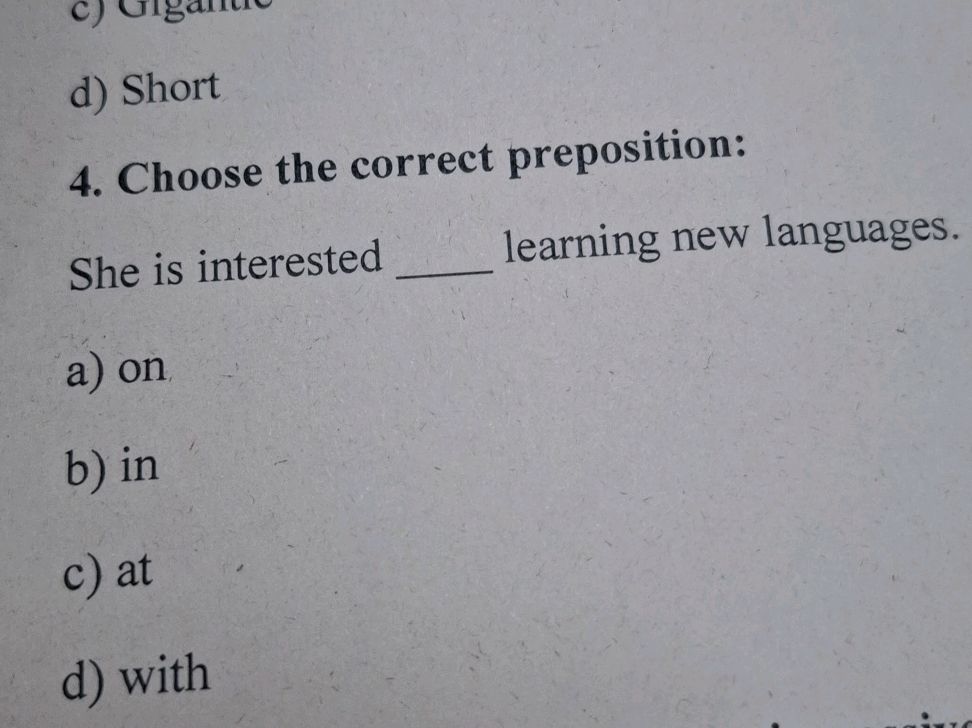 4. Choose the correct preposition: She is | StudyX