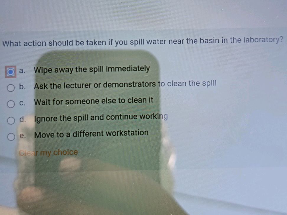 What action should be taken if you spill | StudyX