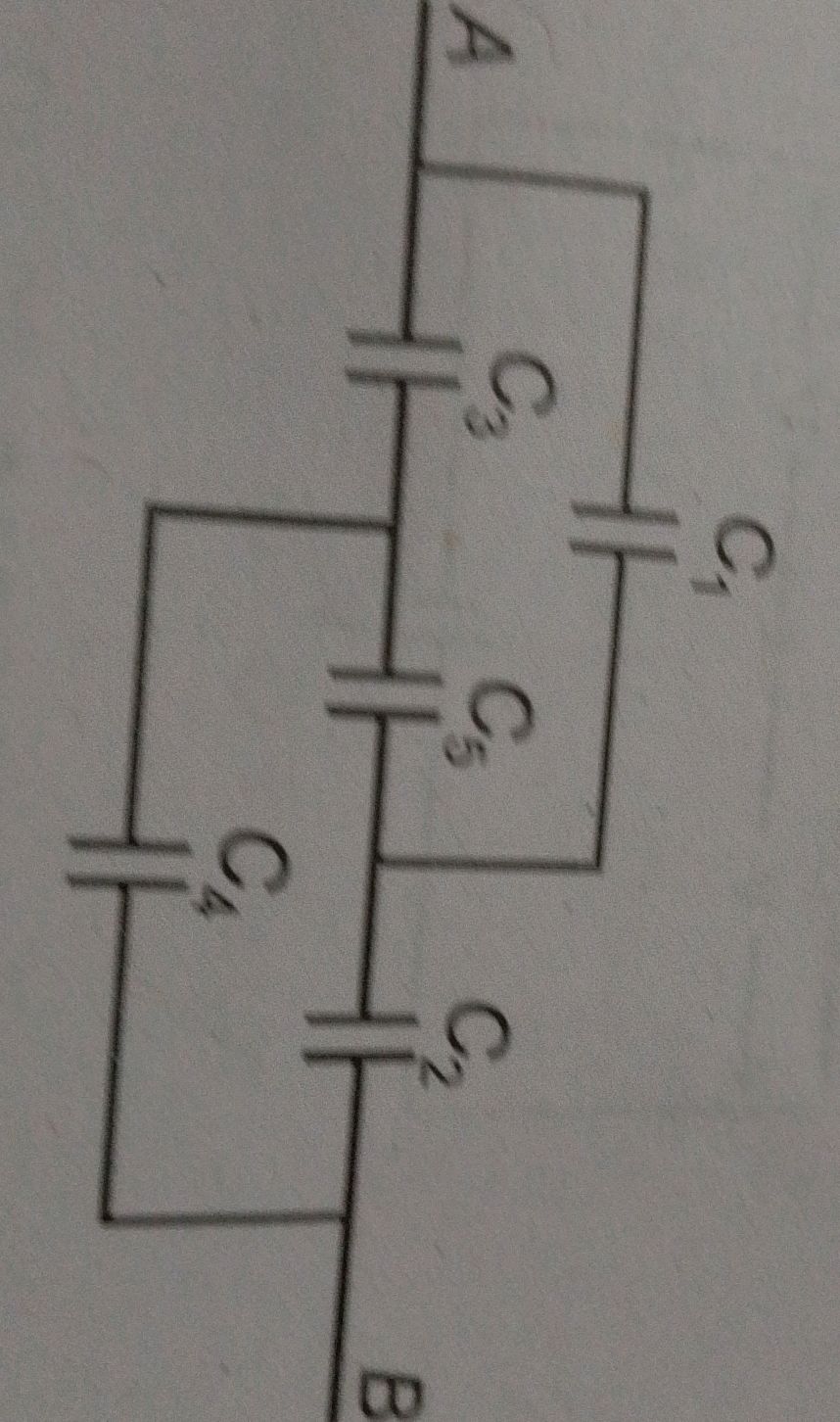 A circuit diagram with capacitors labeled as | StudyX