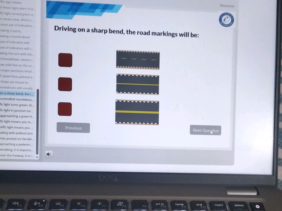 Driving on a sharp bend, the road markings | StudyX