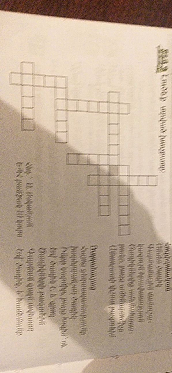 The image contains a crossword puzzle with | StudyX