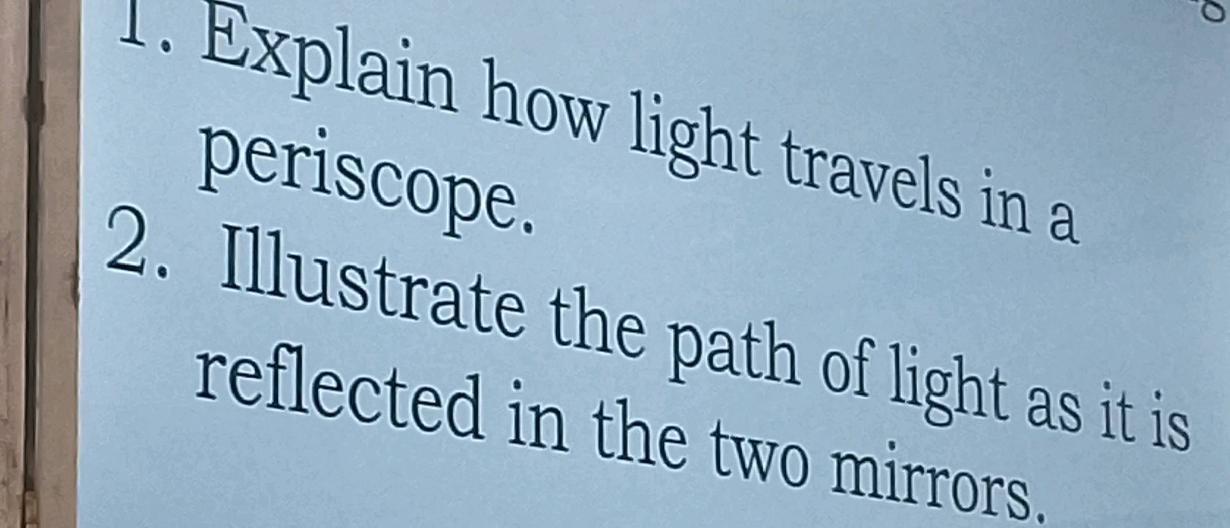 1 Explain how light travels in a periscope 2 | StudyX